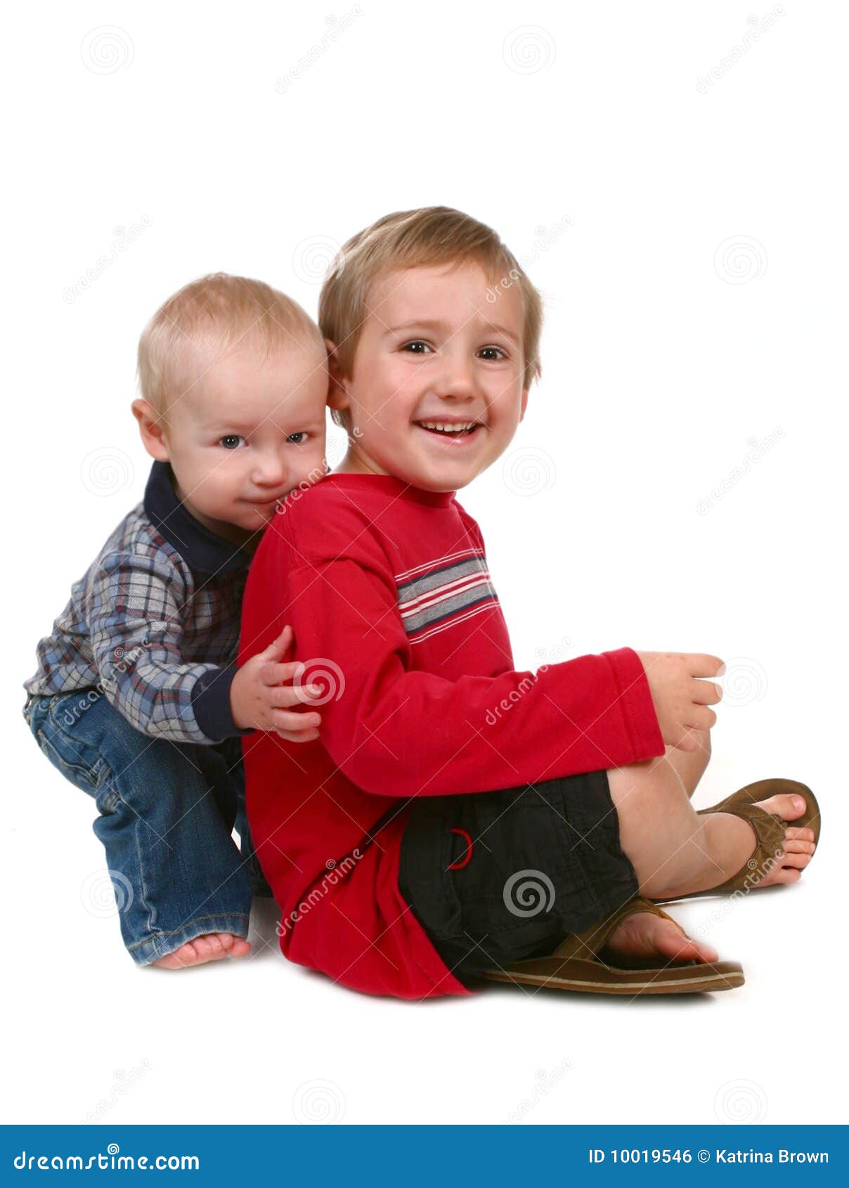Two Brothers Smiling and Sitting Together Stock Photo - Image of ...