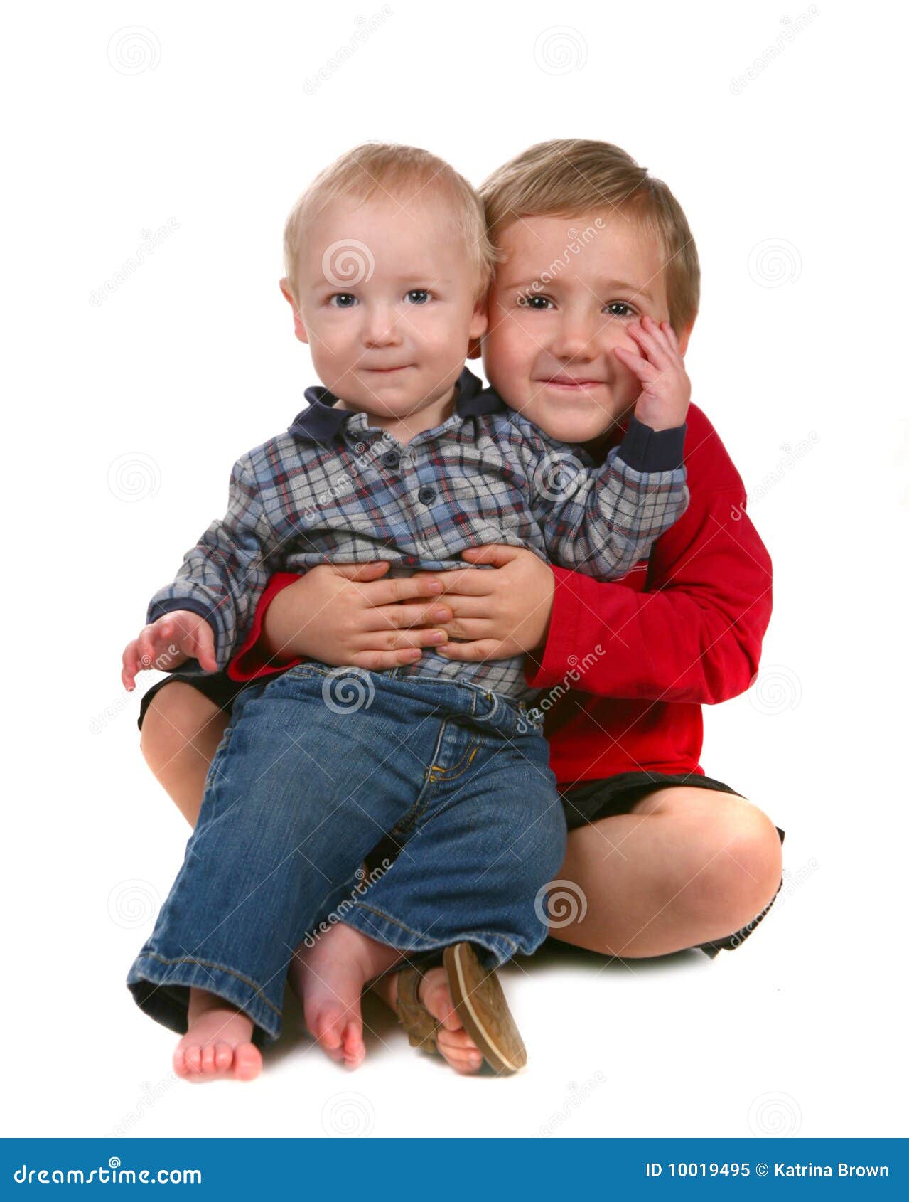 Two Brothers Smiling and Sitting Together on White Stock Image - Image ...