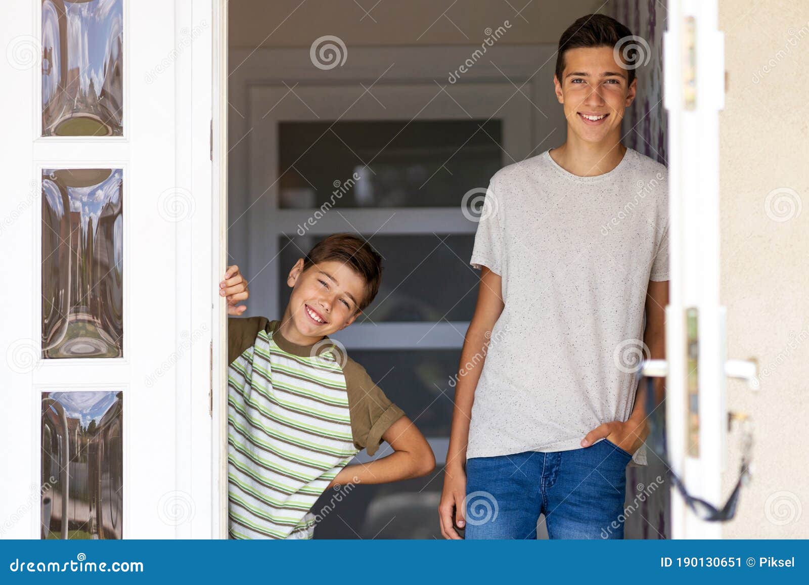 Two Brothers Standing in Doorway Stock Image - Image of leisure ...