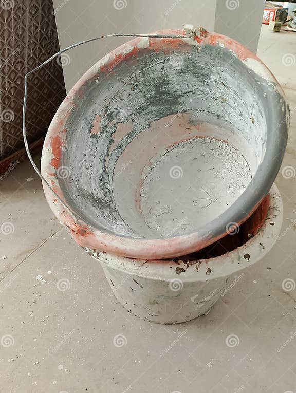 Two Buckets Piled Up and almost Falling Stock Photo - Image of falling ...