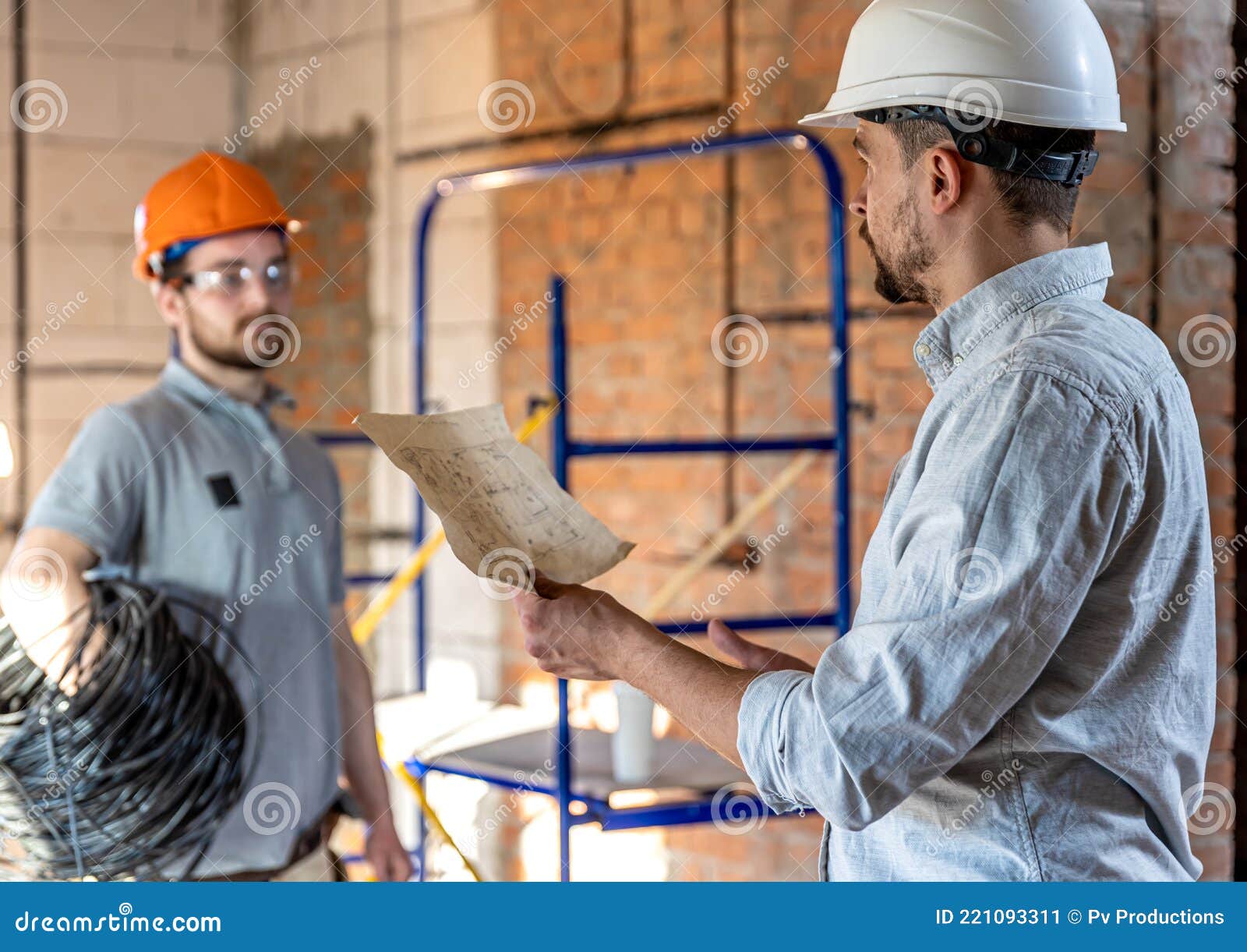 Two Builders Collaborate To Build a New Home Stock Image - Image of ...