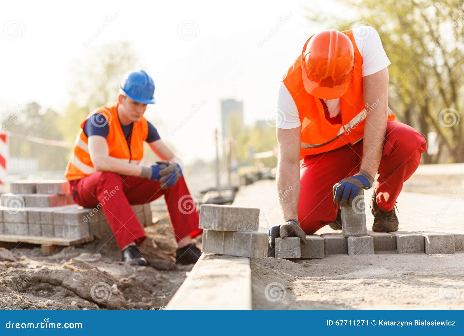 Two Builders on Construction Site Stock Image - Image of materials ...