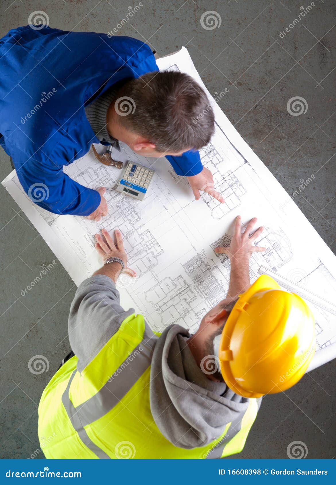 Two Builders Discuss Construction Blueprints Stock Photo - Image of ...