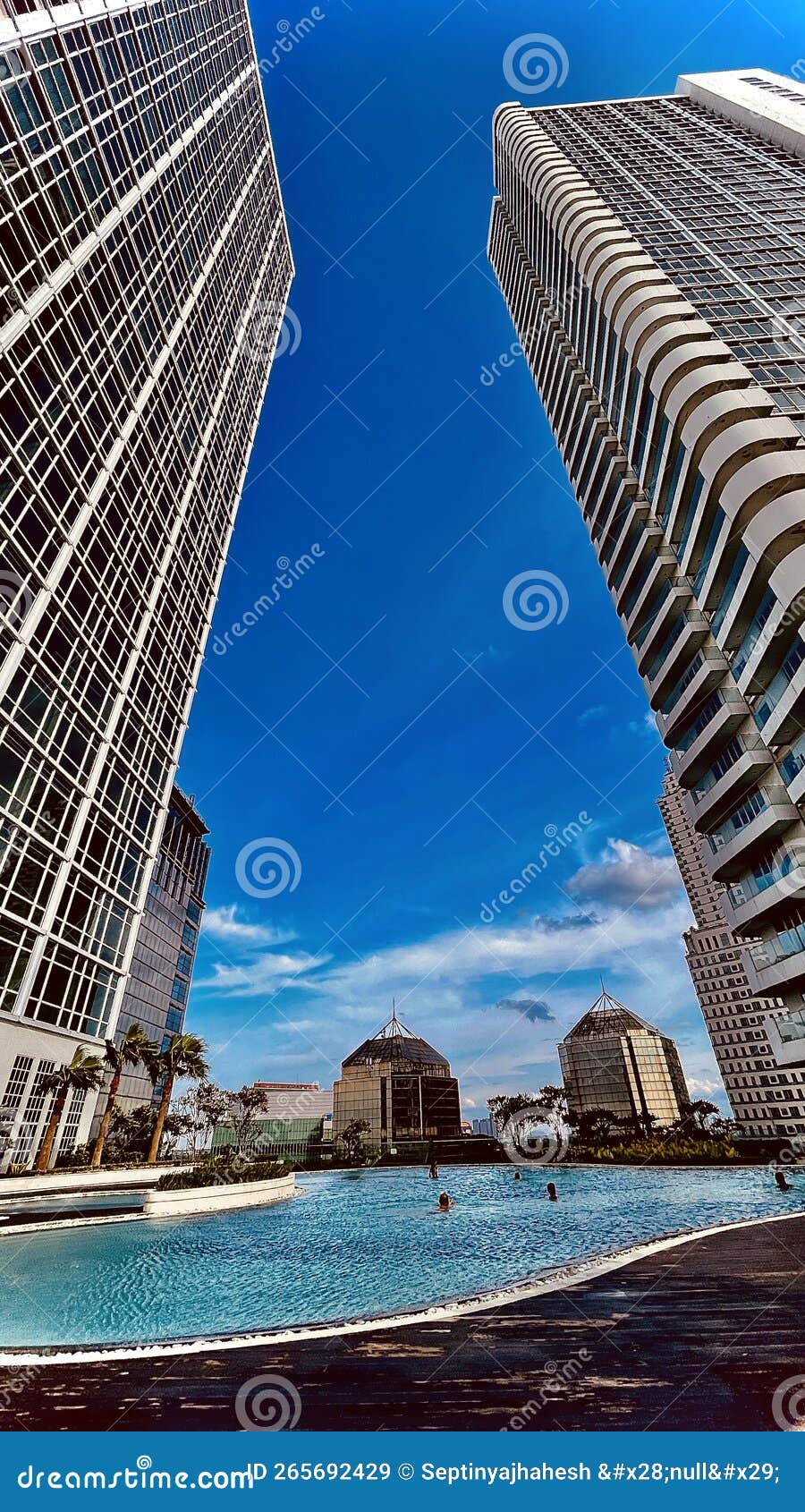 Two apartment Buildings stock image. Image of pool, landscape - 265692429