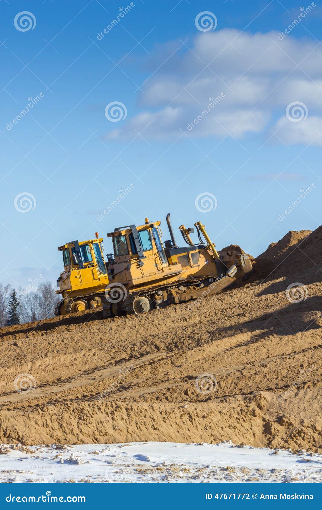Two bulldozer at Work stock photo. Image of industrial - 47671772