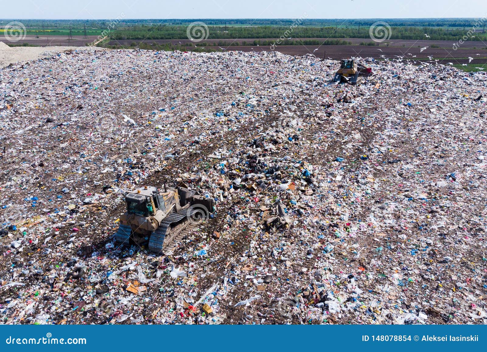 Two Bulldozer Working on Mountain of Garbage in Landfill Stock Photo ...