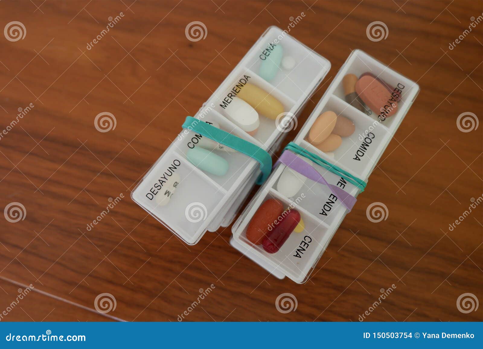 Two Bundles of Boxes with daily Doses of Tablets of Different Colors ...