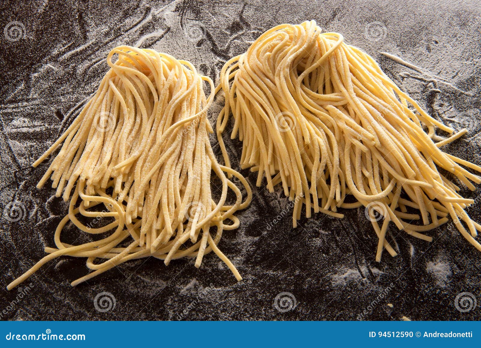 Two bundles of spaghetti stock photo. Image of flour - 94512590