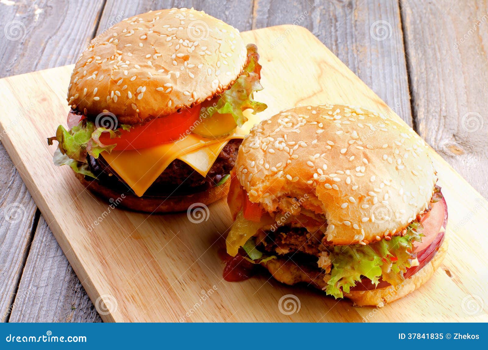 Two Burgers stock image. Image of freshness, indulgence - 37841835