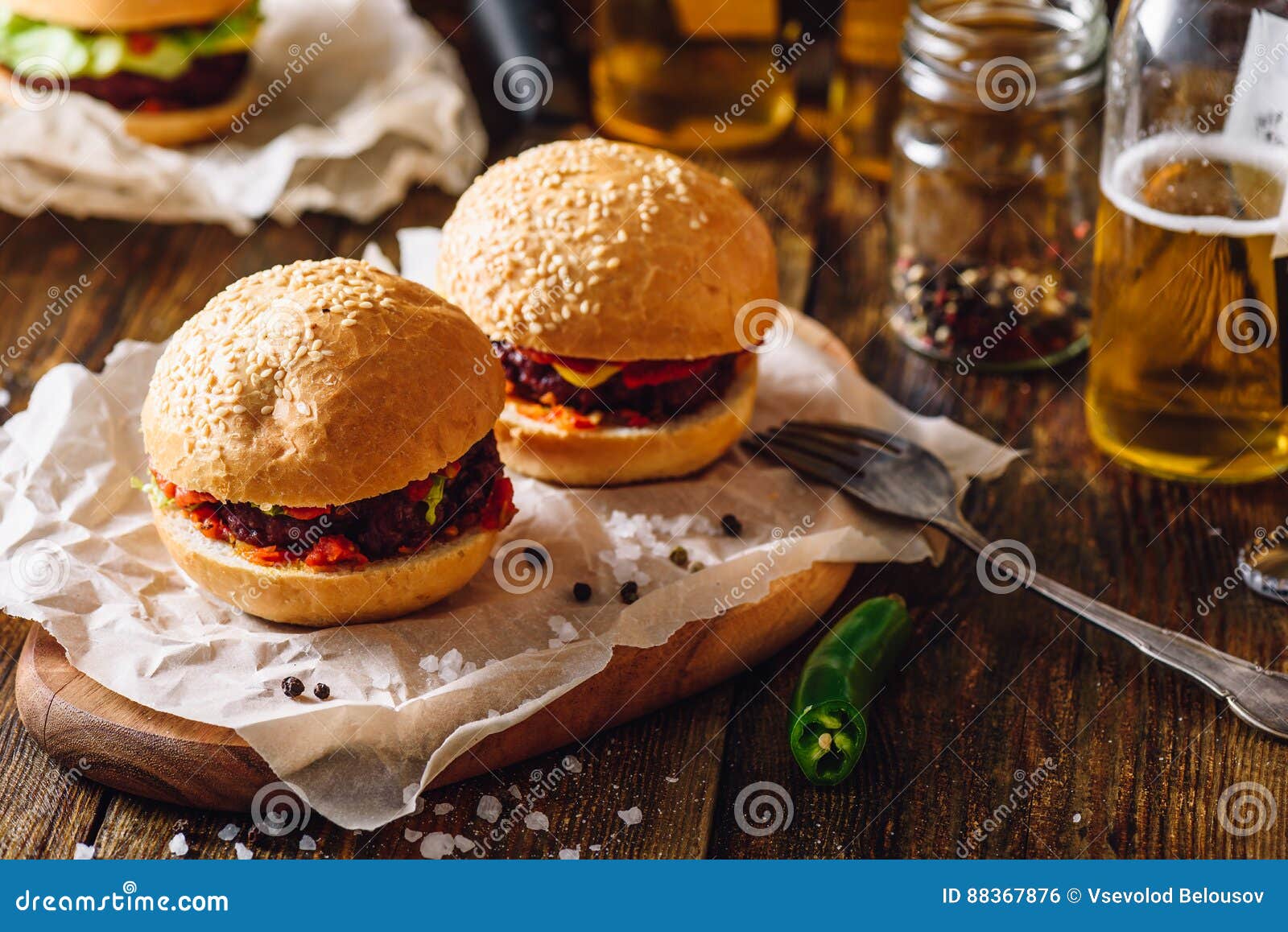 Two Burgers and Beer Bottles. Stock Photo - Image of drink, bread: 88367876