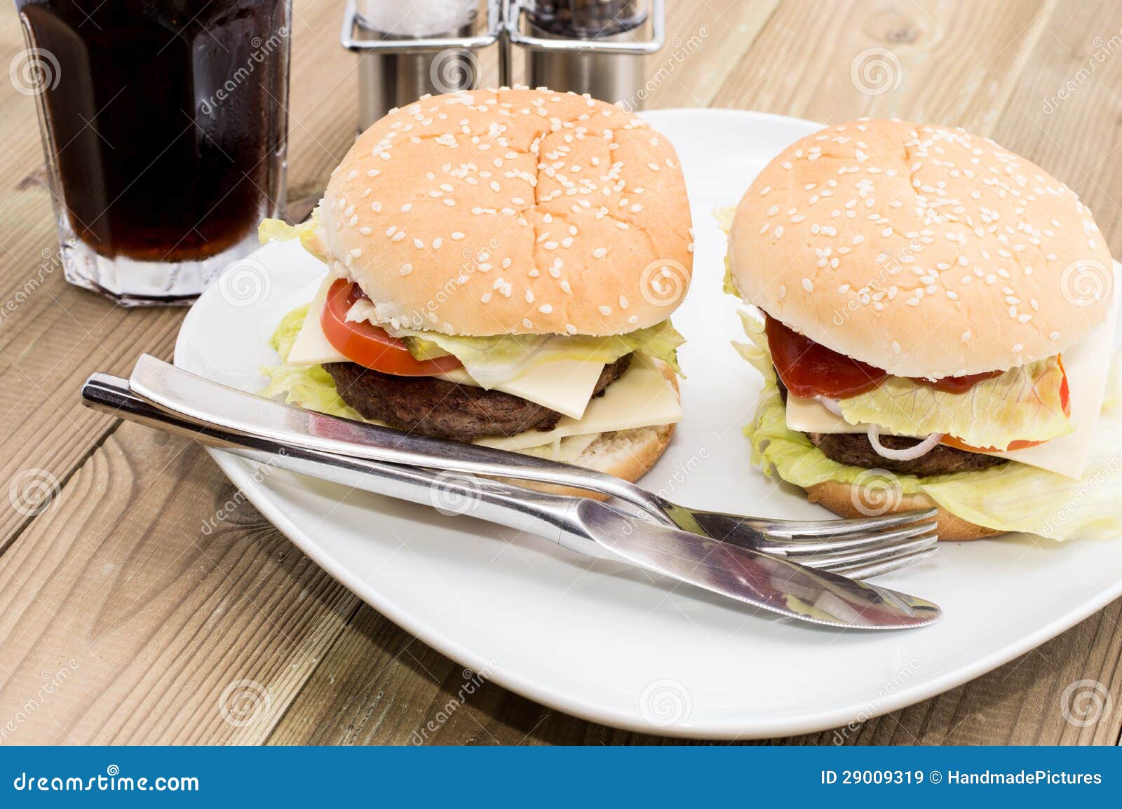 Two Burgers on a plate stock image. Image of hamburger - 29009319