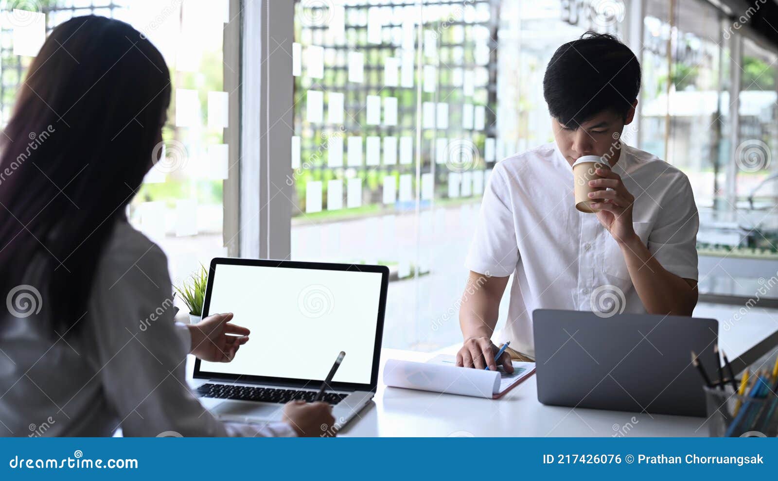 Two Business Colleagues Discussing Ideas of Project Offer in Office ...