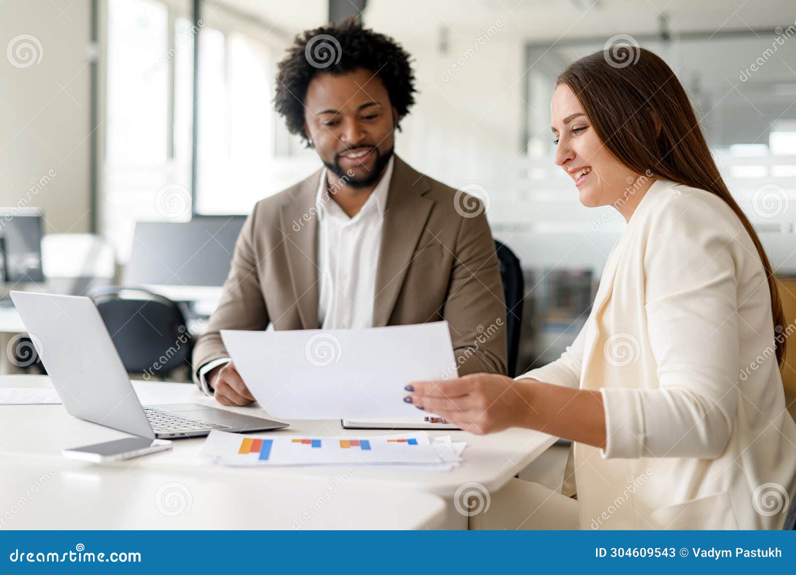 Two Business Colleagues Engaging in a Constructive Discussion Stock ... Two Business Colleagues Engaging in a Constructive Discussion Stock ...