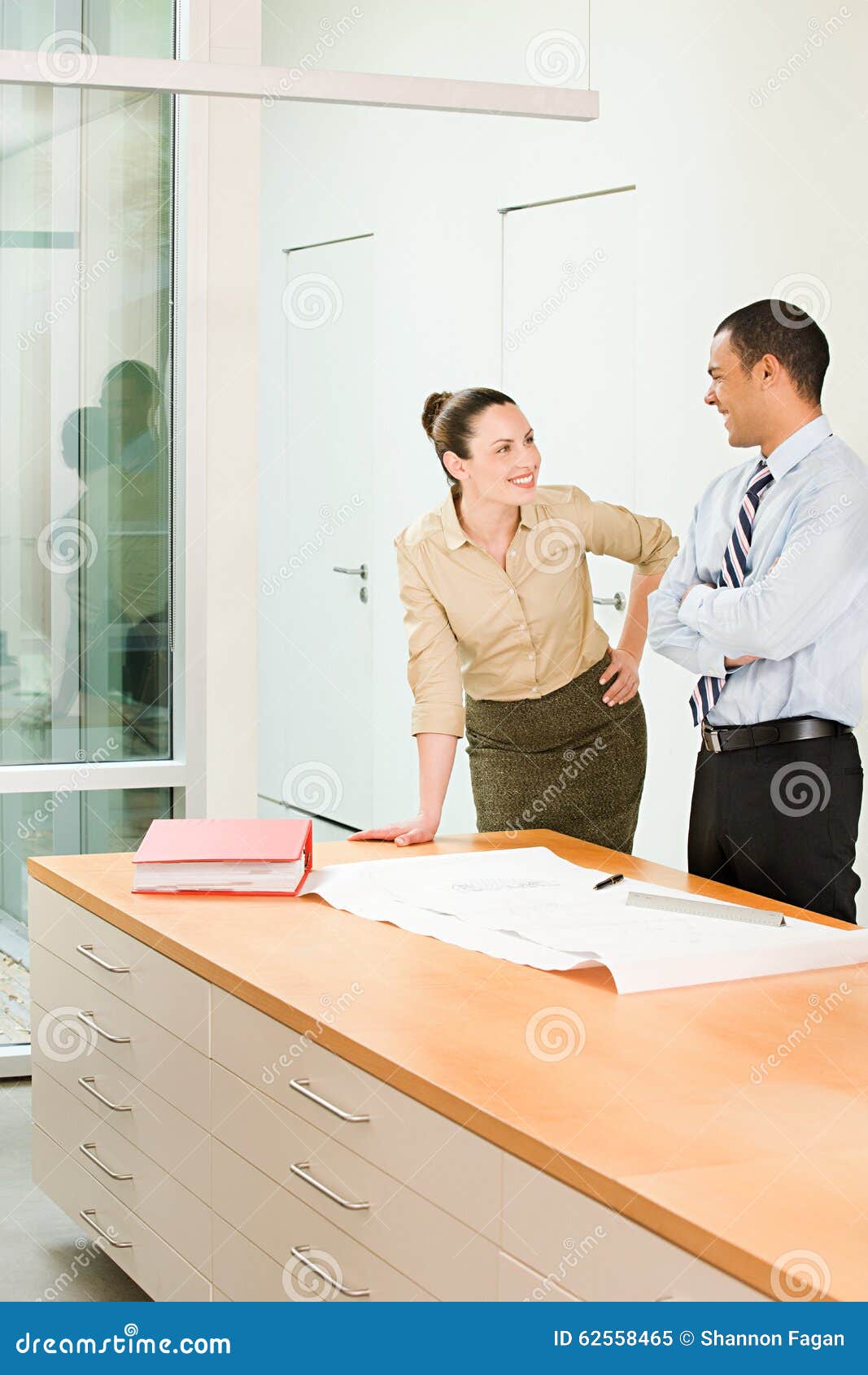 Two Business Colleagues Talking Stock Image - Image of adult, indoors ...