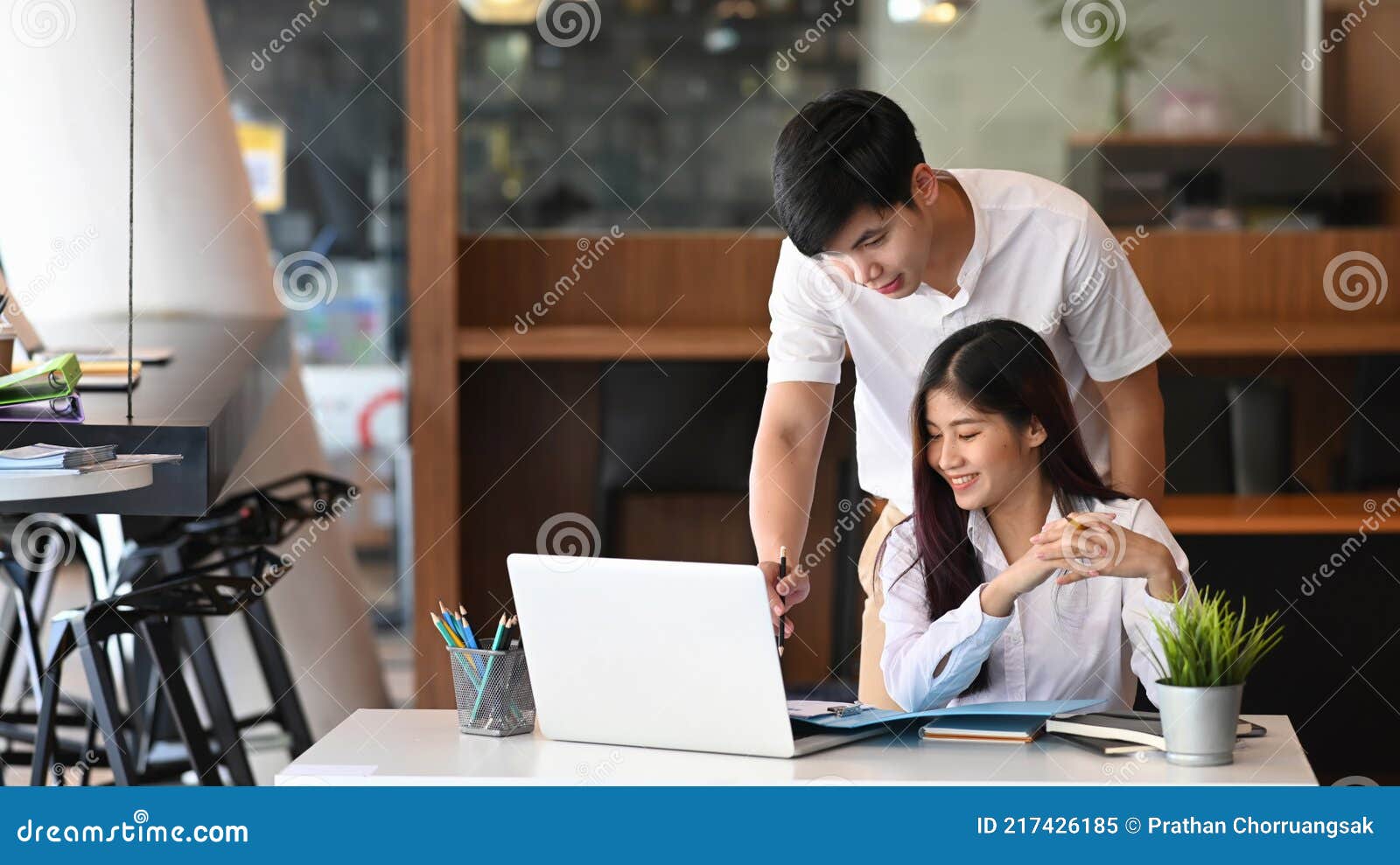 Two Business Colleagues Talking and Working Together in Office. Stock ...