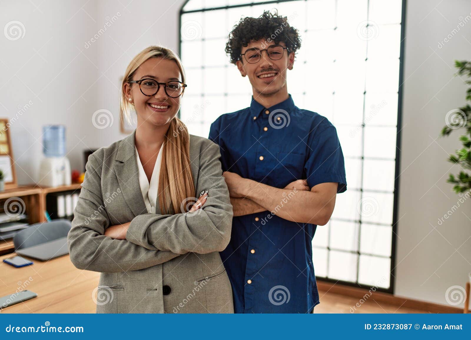 Two Business Executives with Arms Crossed Gesture Standing at the ...