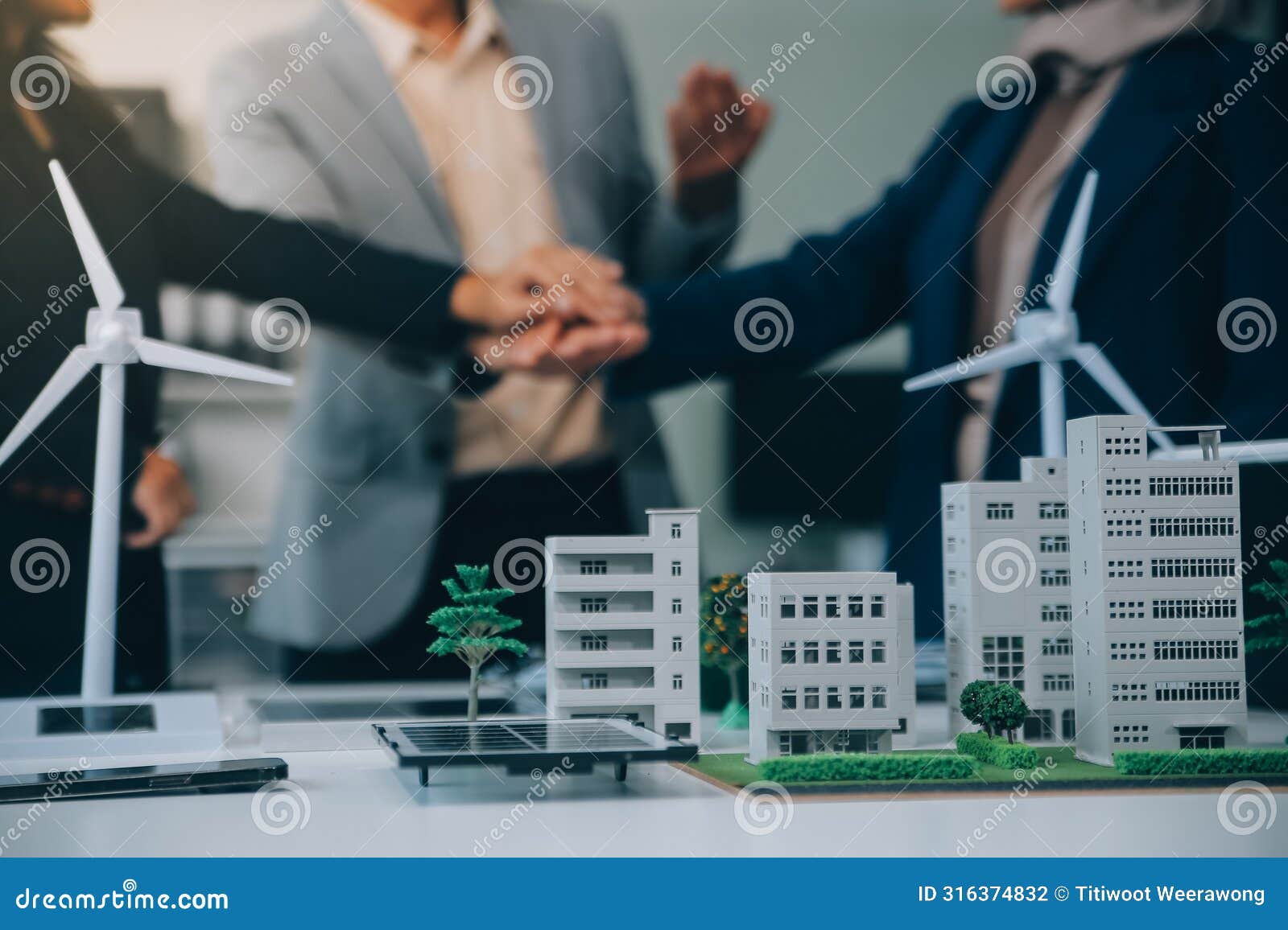 Two Business Executives, Elegantly Attired in Suits, Join Hands in a ...