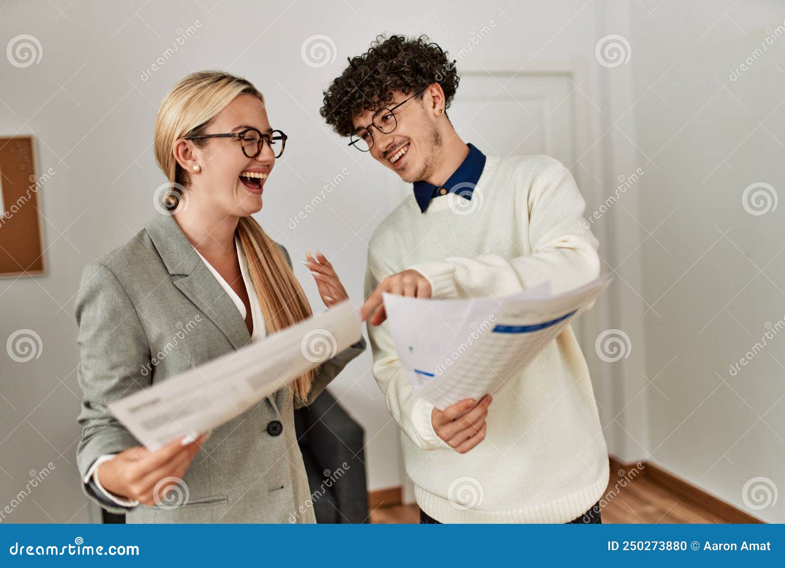 Two Business Executives Smiling Happy Working at the Office Stock Photo ...