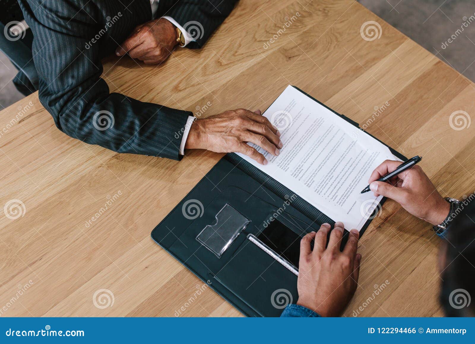 Two Business Men Signing Contract Stock Photo - Image of young, view ...