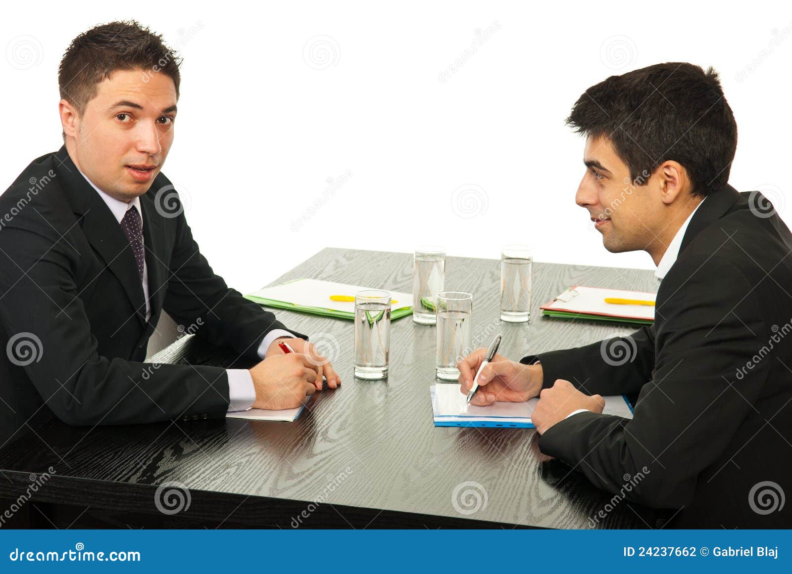 Two Business Men Talking at Meeting Stock Photo - Image of suits ...