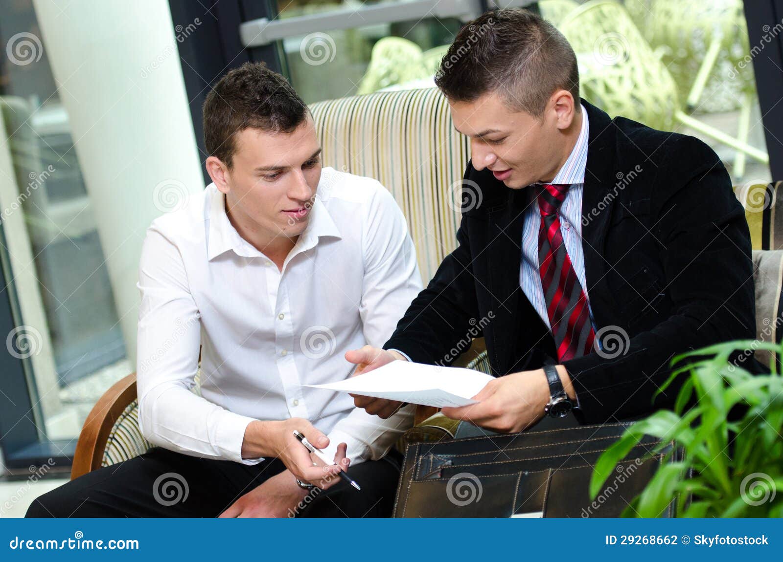 Two Business Men Talking about a Project Stock Photo - Image of happy ...