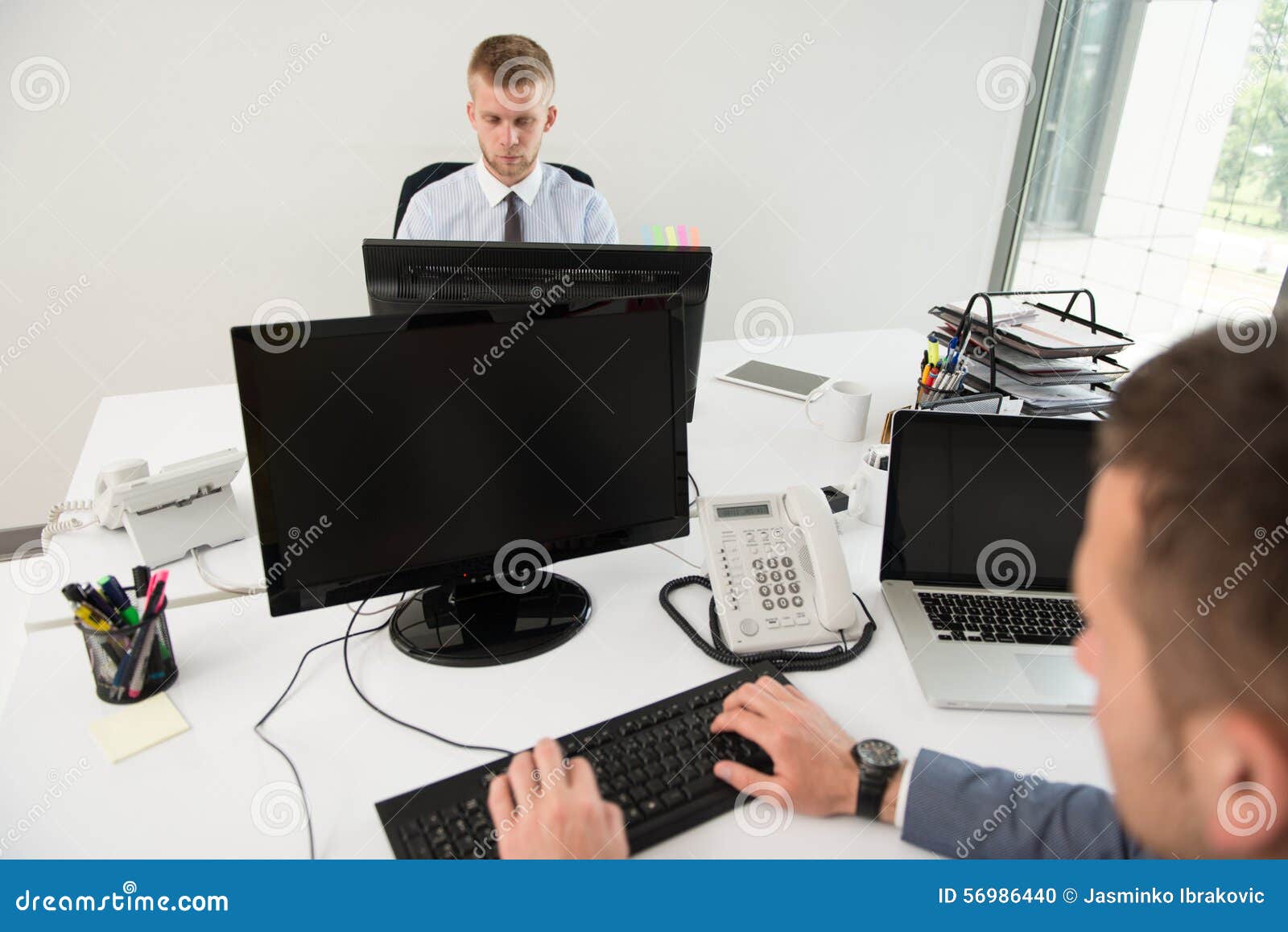 Two Business Men Working on a Computer Stock Photo - Image of computer ...
