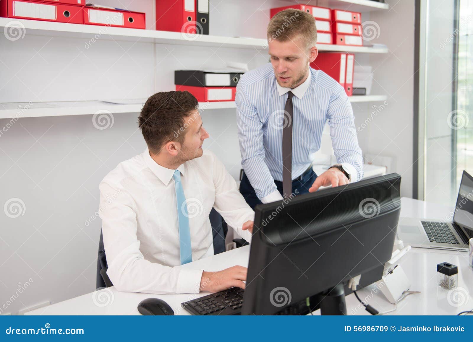 Two Business Men Working on a Computer Stock Image - Image of person ...