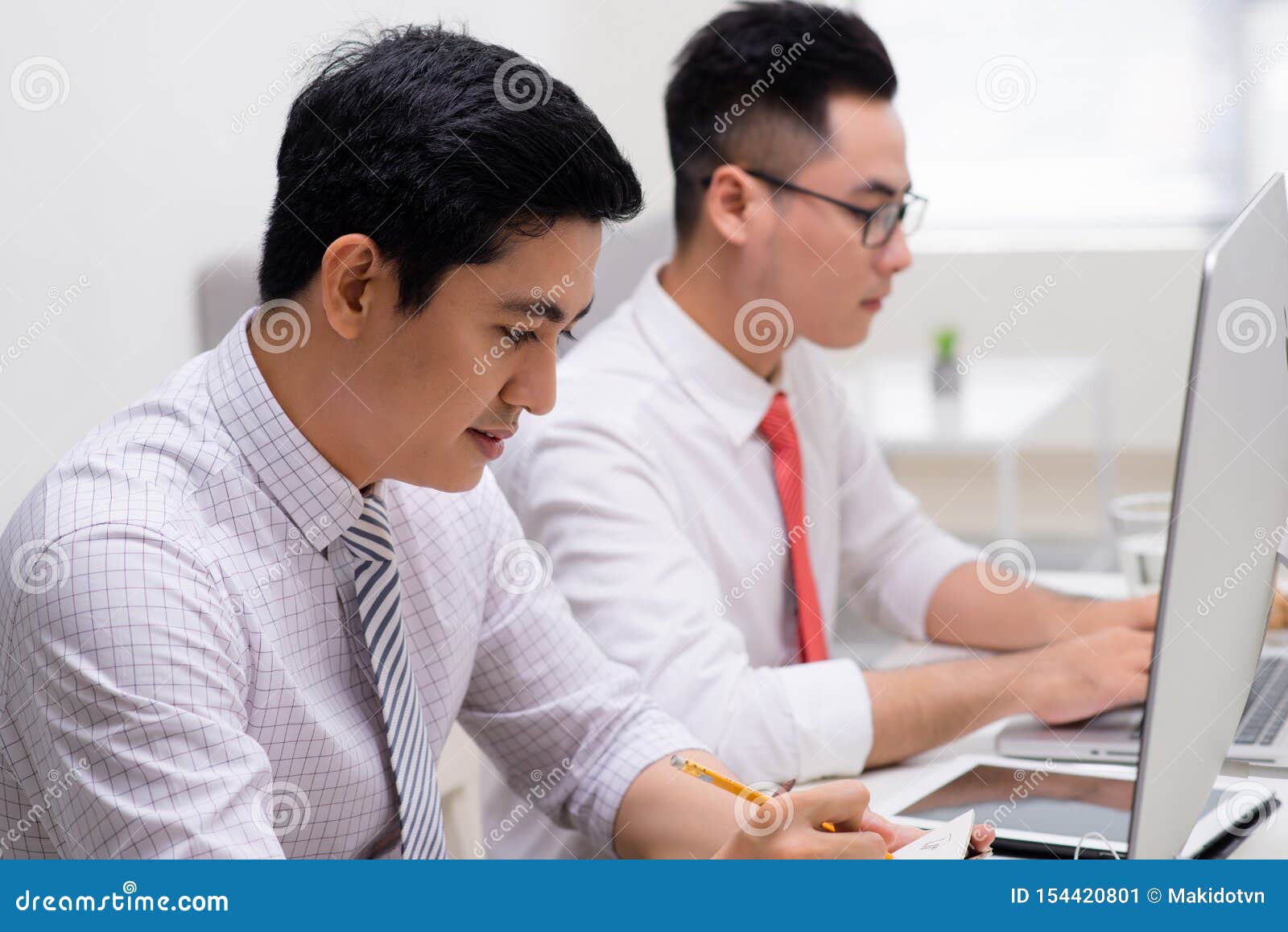 Two Business Men Working at Pc in Office Stock Image - Image of ...