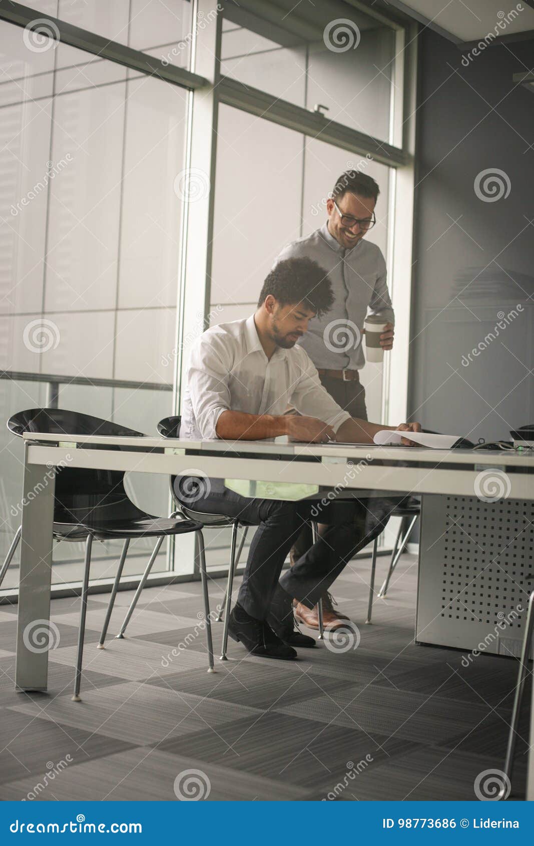 Two Business Men Working Together in Office. Stock Photo - Image of ...