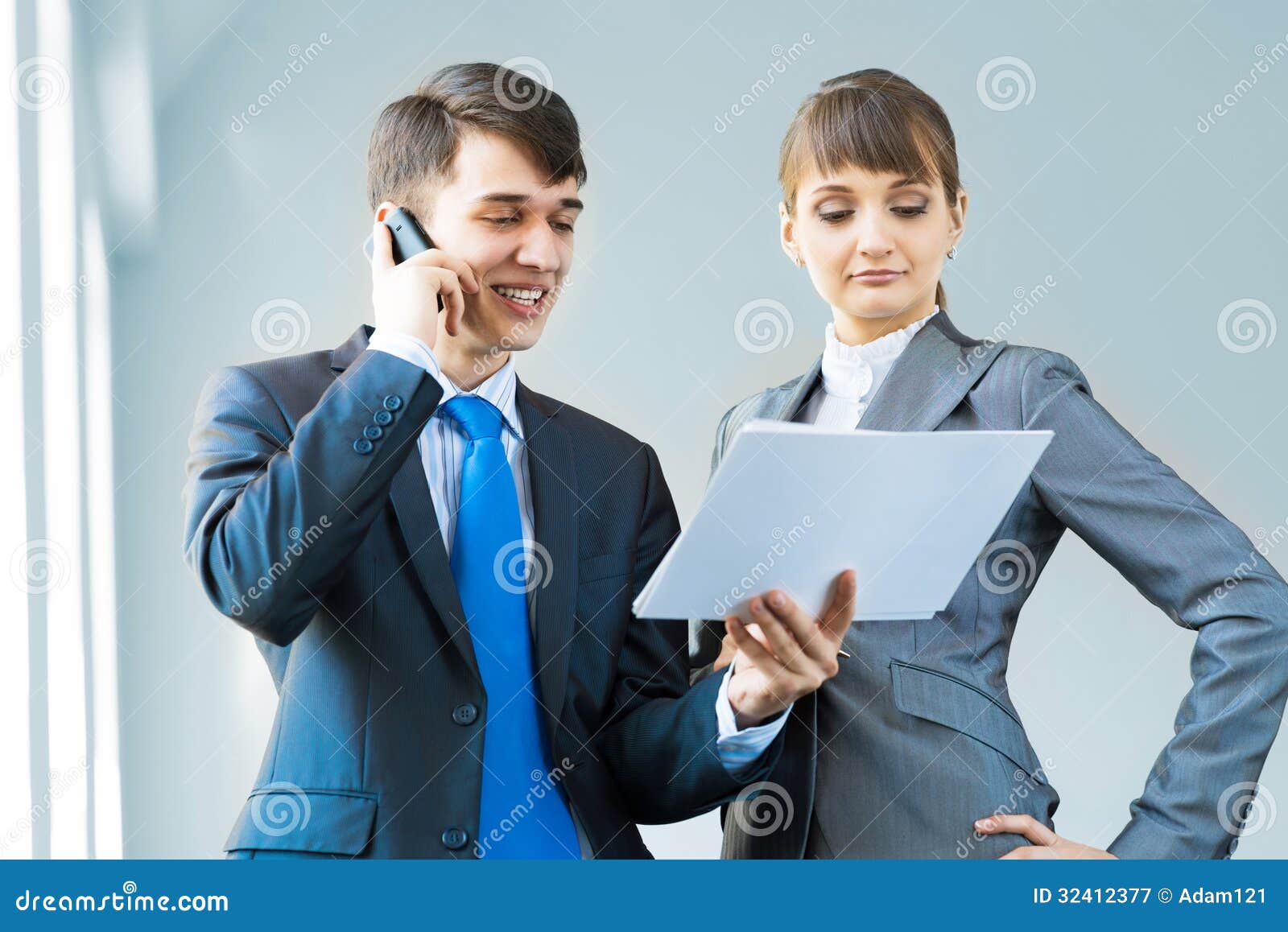 Two Business Partners Discussing Reports Stock Image - Image of ...
