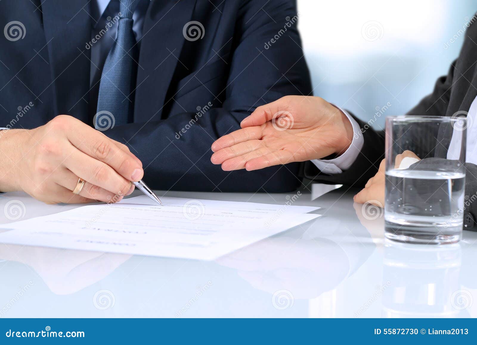 Two Business Partners Signing a Document Stock Photo - Image of busy ...