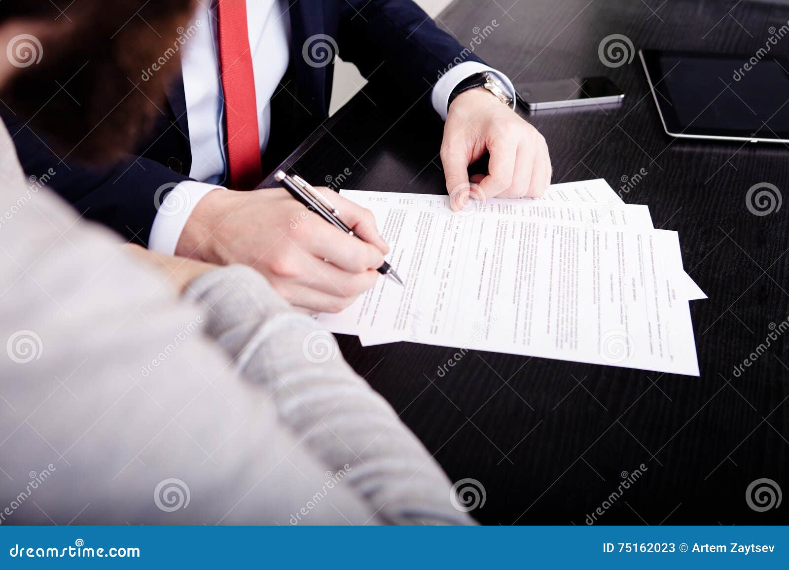 Two Business Partners Signing a Document. Contract Stock Image - Image ...