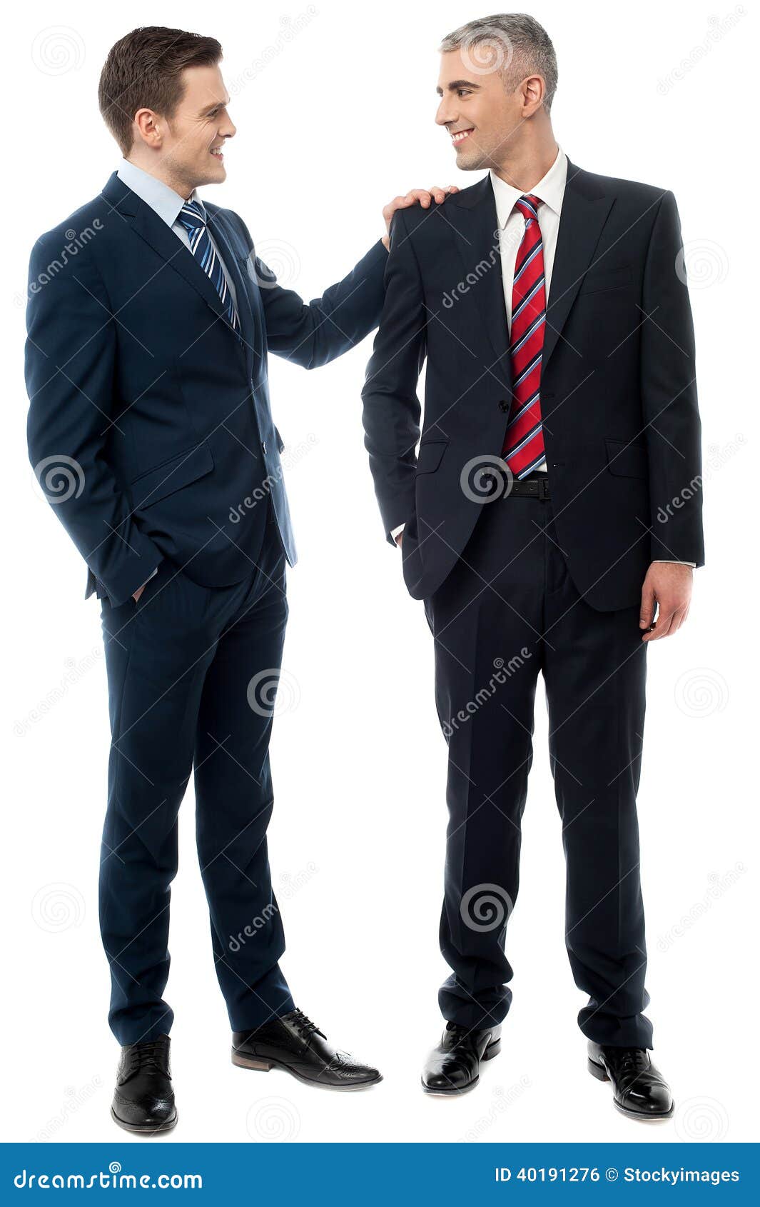 Two Business Partners Talking Together Stock Photo - Image of business ...