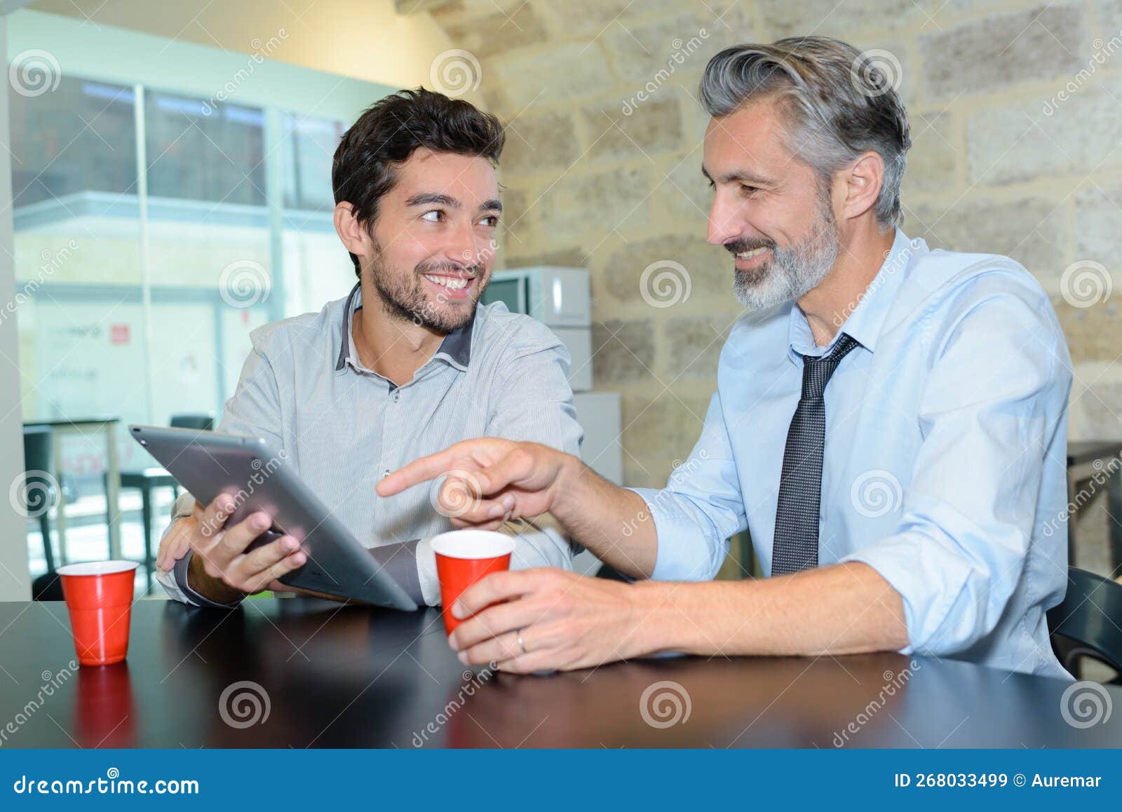 Two Business Partners Working in Cooperation Stock Image - Image of ...