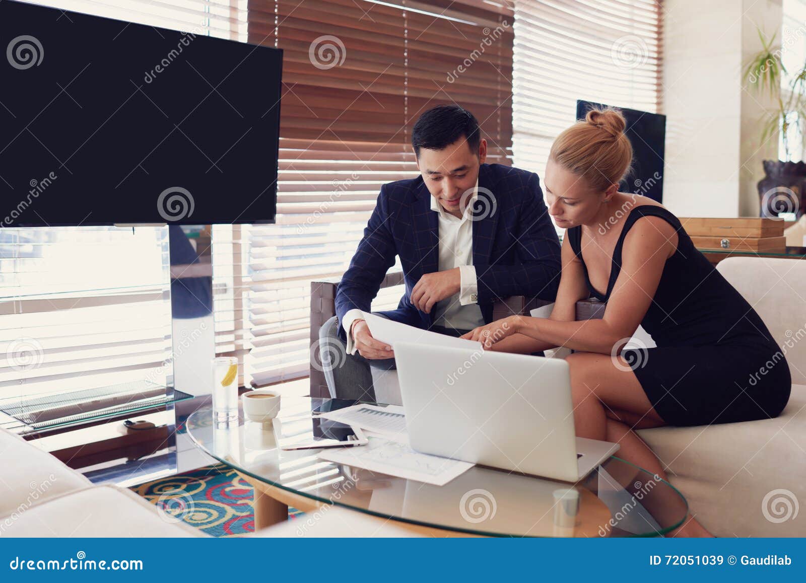 Two Business Partners are Working Together in Modern Interior Stock ...