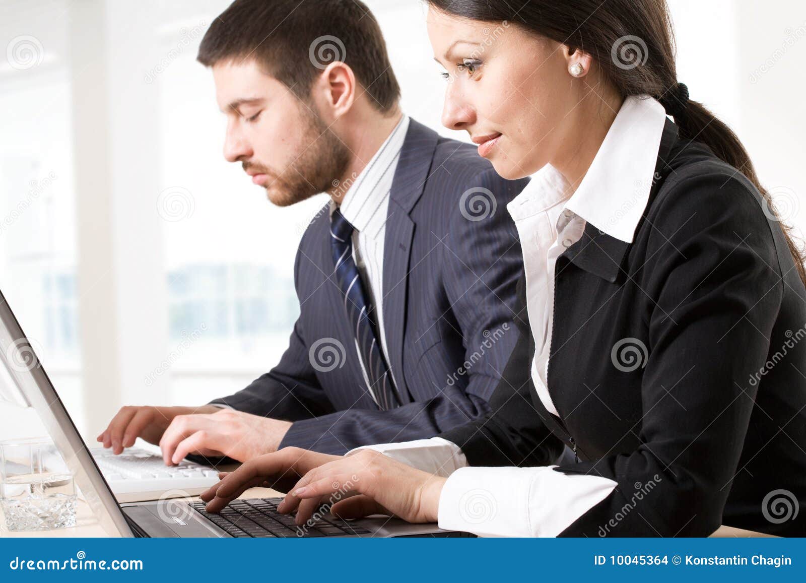 Two business people stock photo. Image of table, group - 10045364