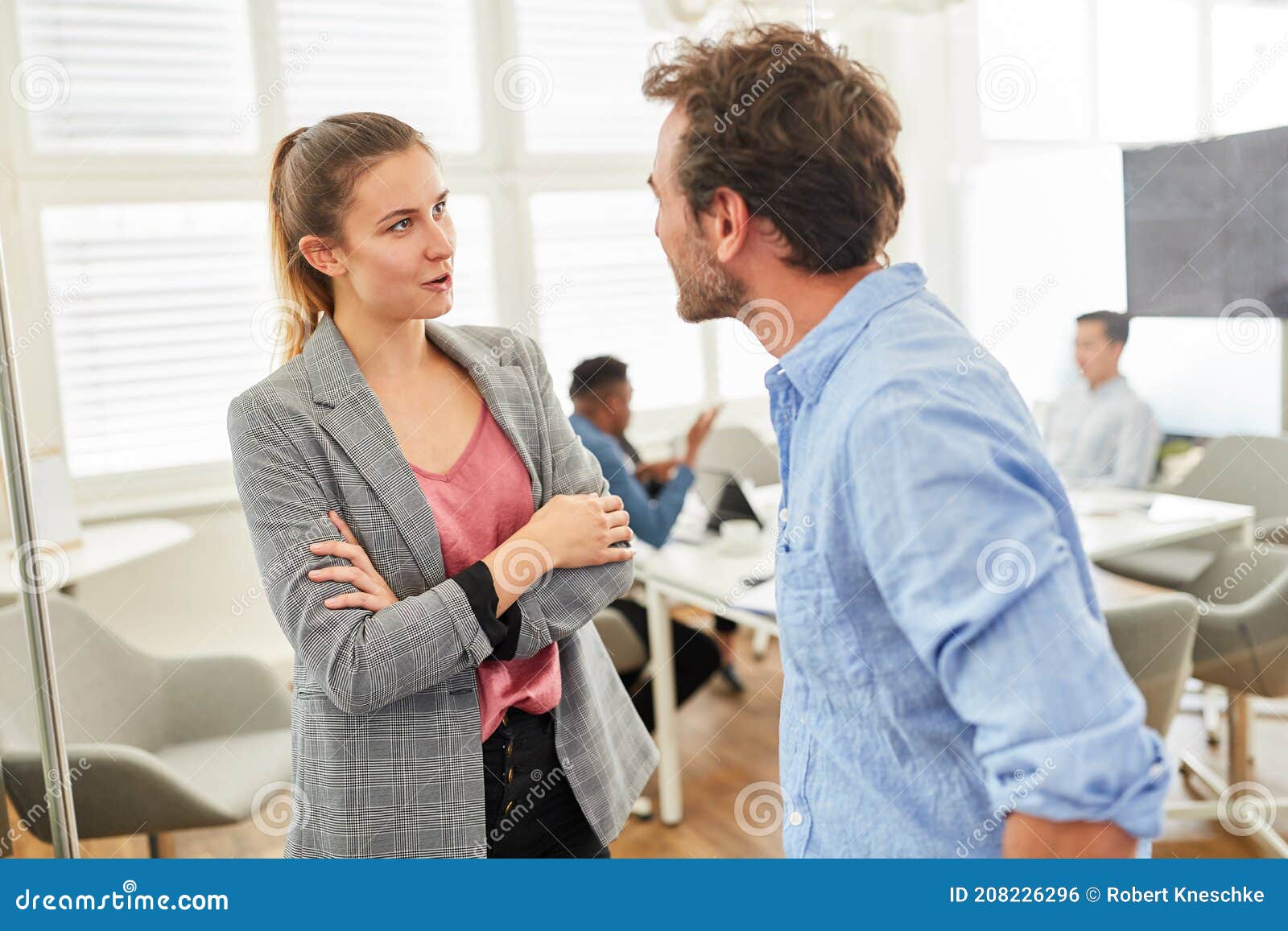 Two Business People in Dialogue in the Office Stock Photo - Image of ...