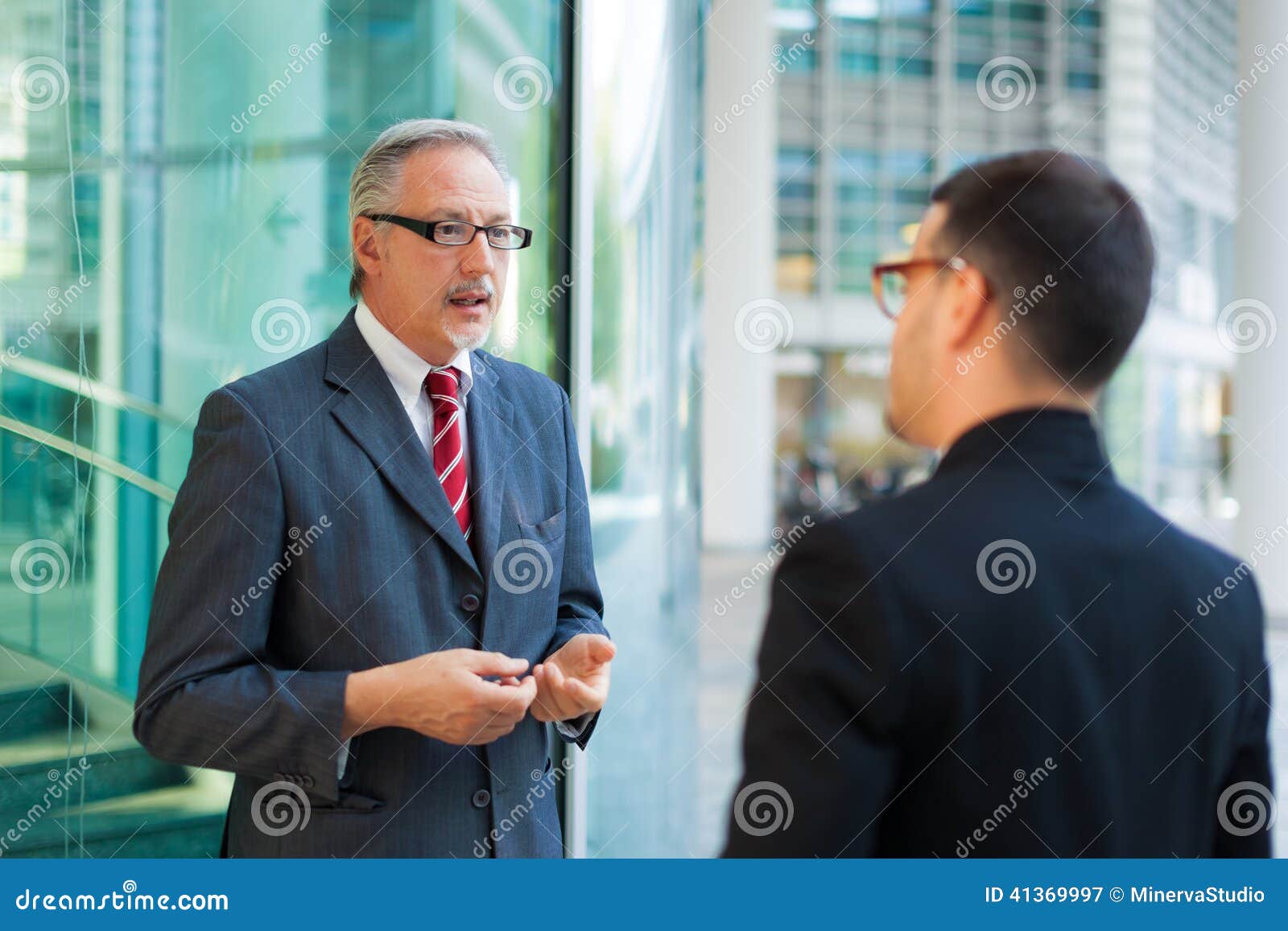 Two Business People Discussing Outdoor Stock Image - Image of ... Two Business People Discussing Outdoor Stock Image - Image of ...