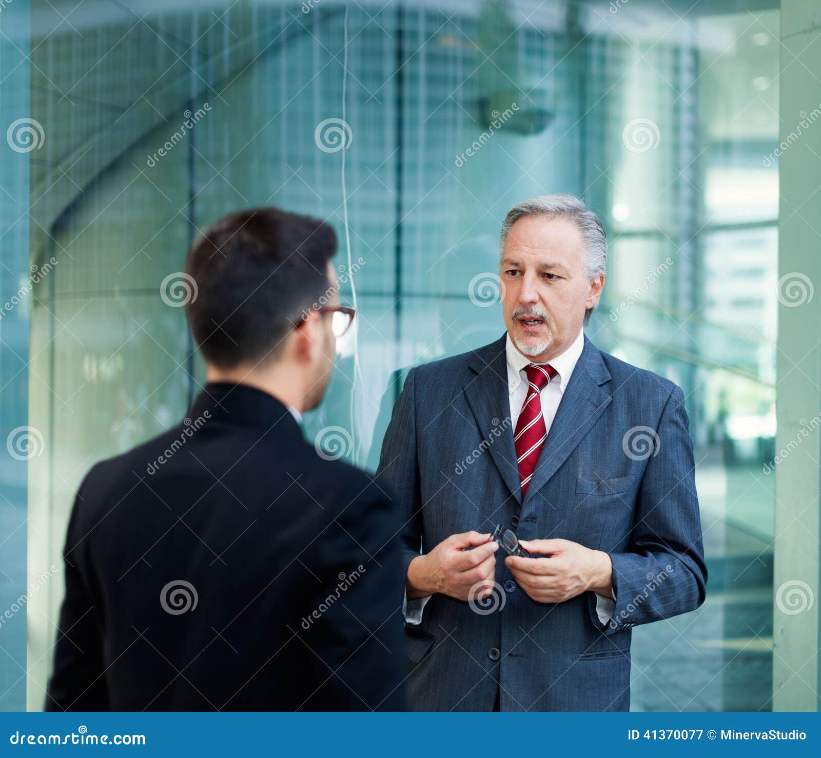 Two Business People Discussing Outdoor Stock Image - Image of growth ... Two Business People Discussing Outdoor Stock Image - Image of growth ...