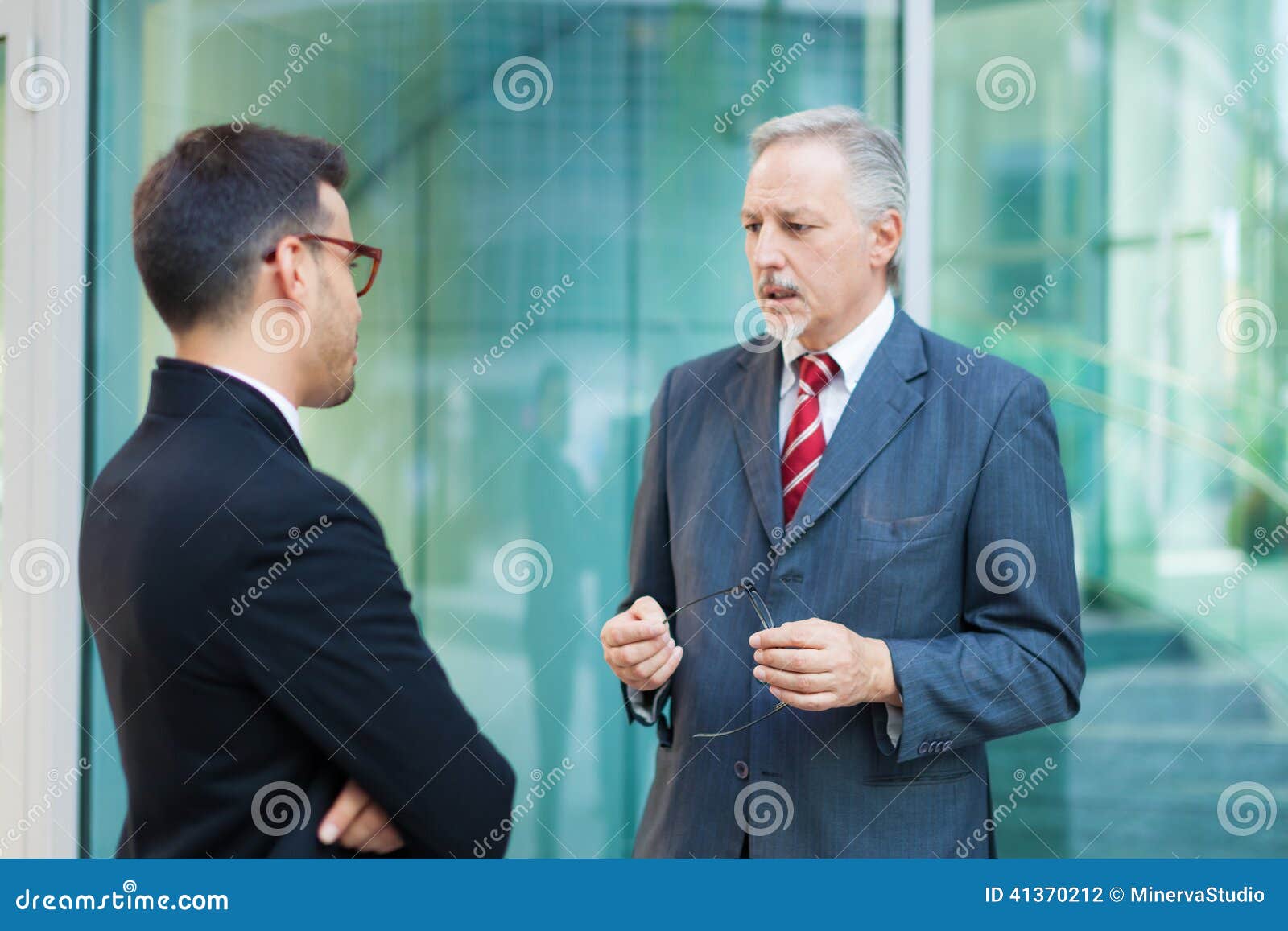 Two Business People Discussing Outdoor Stock Photo - Image of company ... Two Business People Discussing Outdoor Stock Photo - Image of company ...