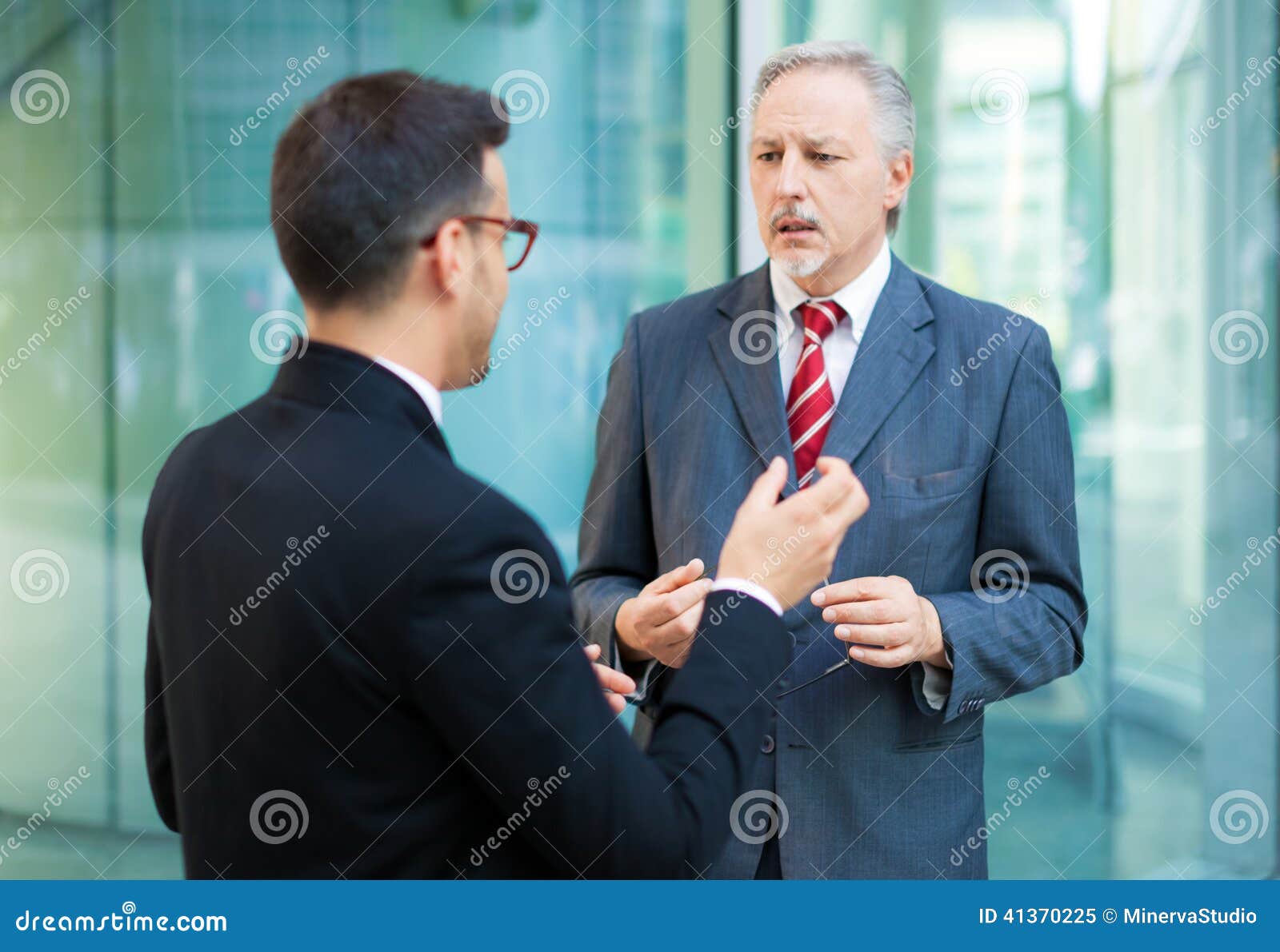 Two Business People Discussing Outdoor Stock Image - Image of ... Two Business People Discussing Outdoor Stock Image - Image of ...