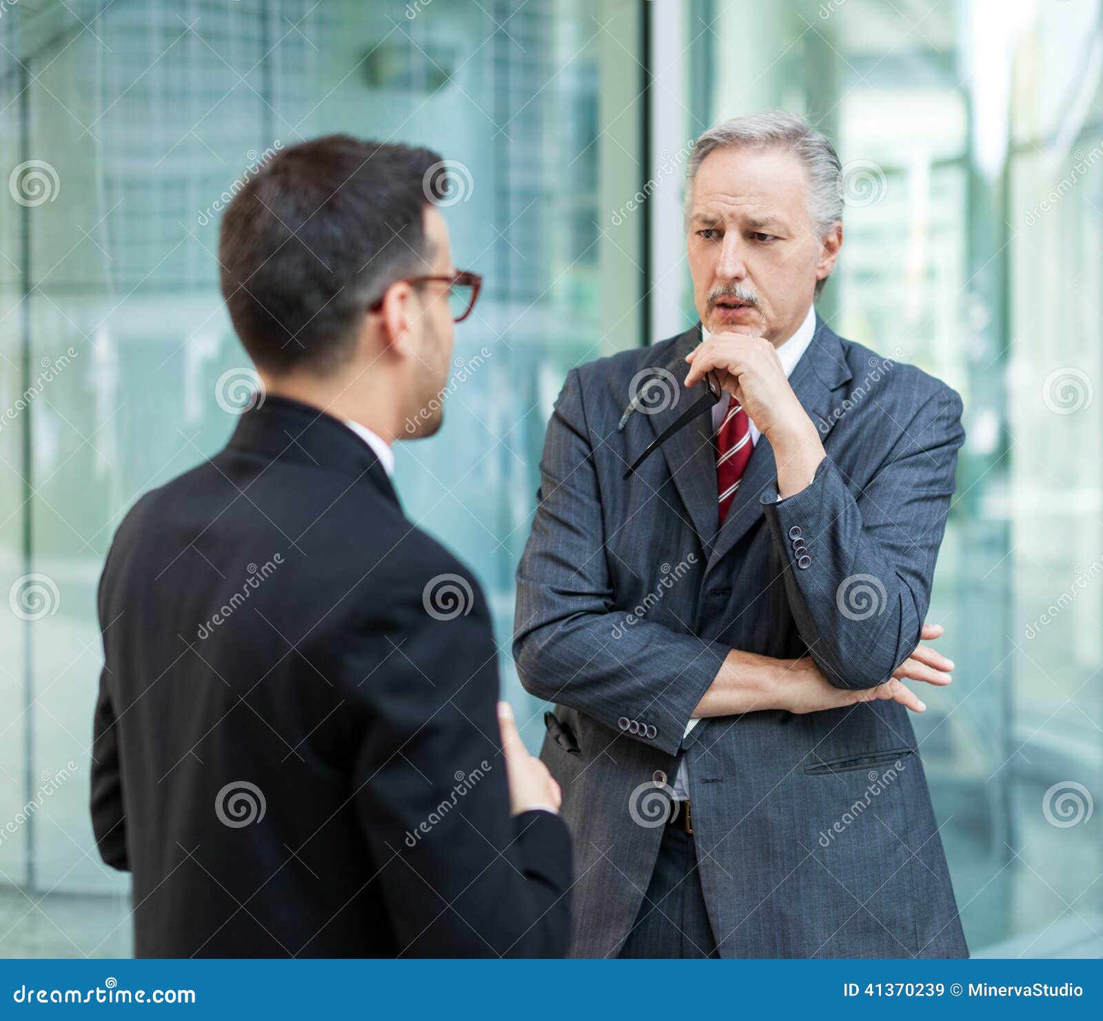 Two Business People Discussing Outdoor Stock Image - Image of company ... Two Business People Discussing Outdoor Stock Image - Image of company ...