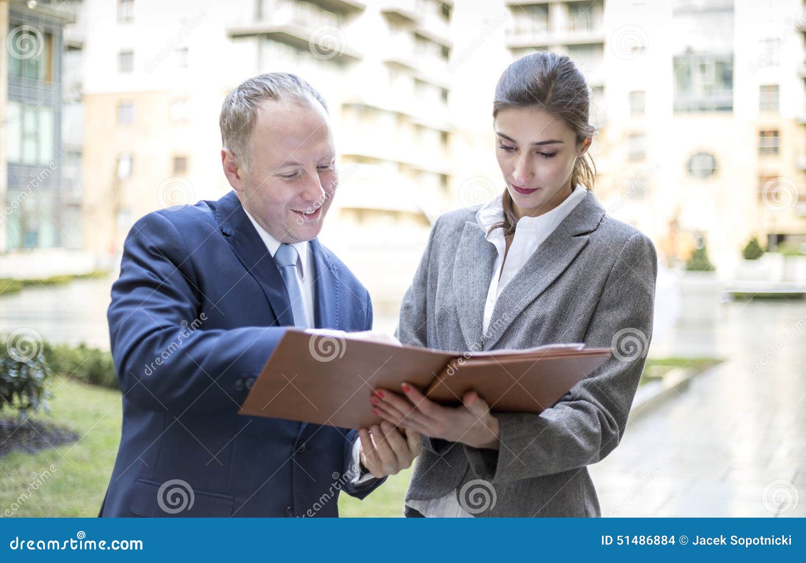 Two Business People Discussing Outside the Office Stock Photo - Image ...
