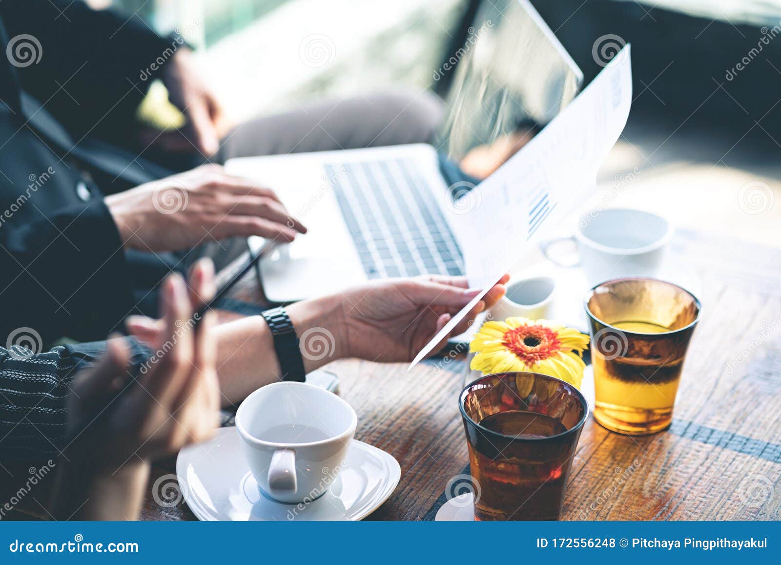 Two Business People Discussing Work in the Cafe. Stock Photo - Image of ...