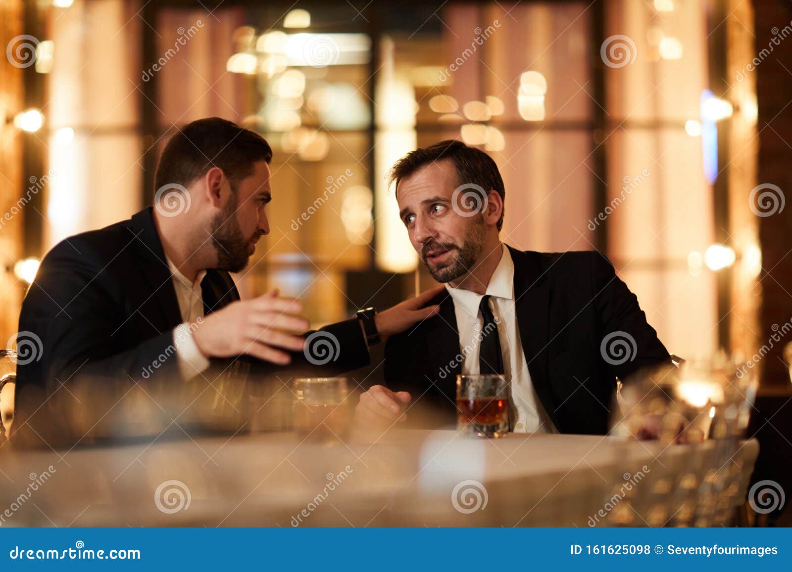 Two Business People Drinking in Restaurant Stock Photo - Image of ...