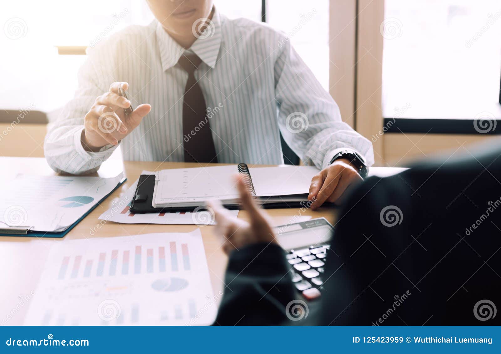 Two Business People Having Discussion in the Office Room. Stock Image ...