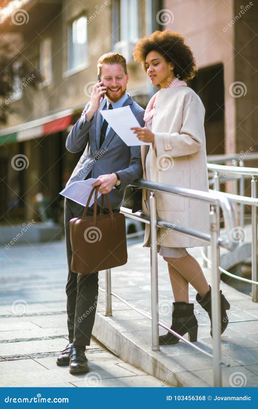 Two Business People in an Informal Conversation Stock Photo - Image of ...