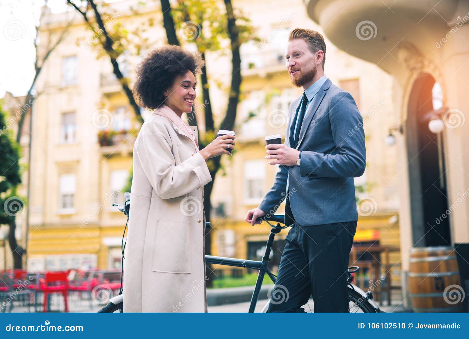 Two Business People in an Informal Conversation Stock Photo - Image of ...