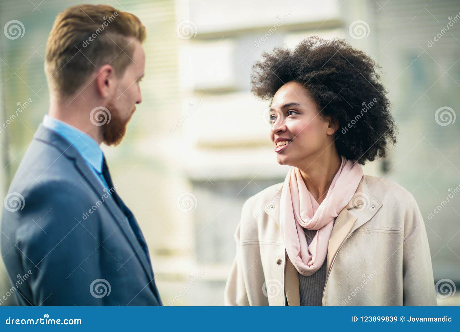 Two Business People in an Informal Conversation Stock Image - Image of ...