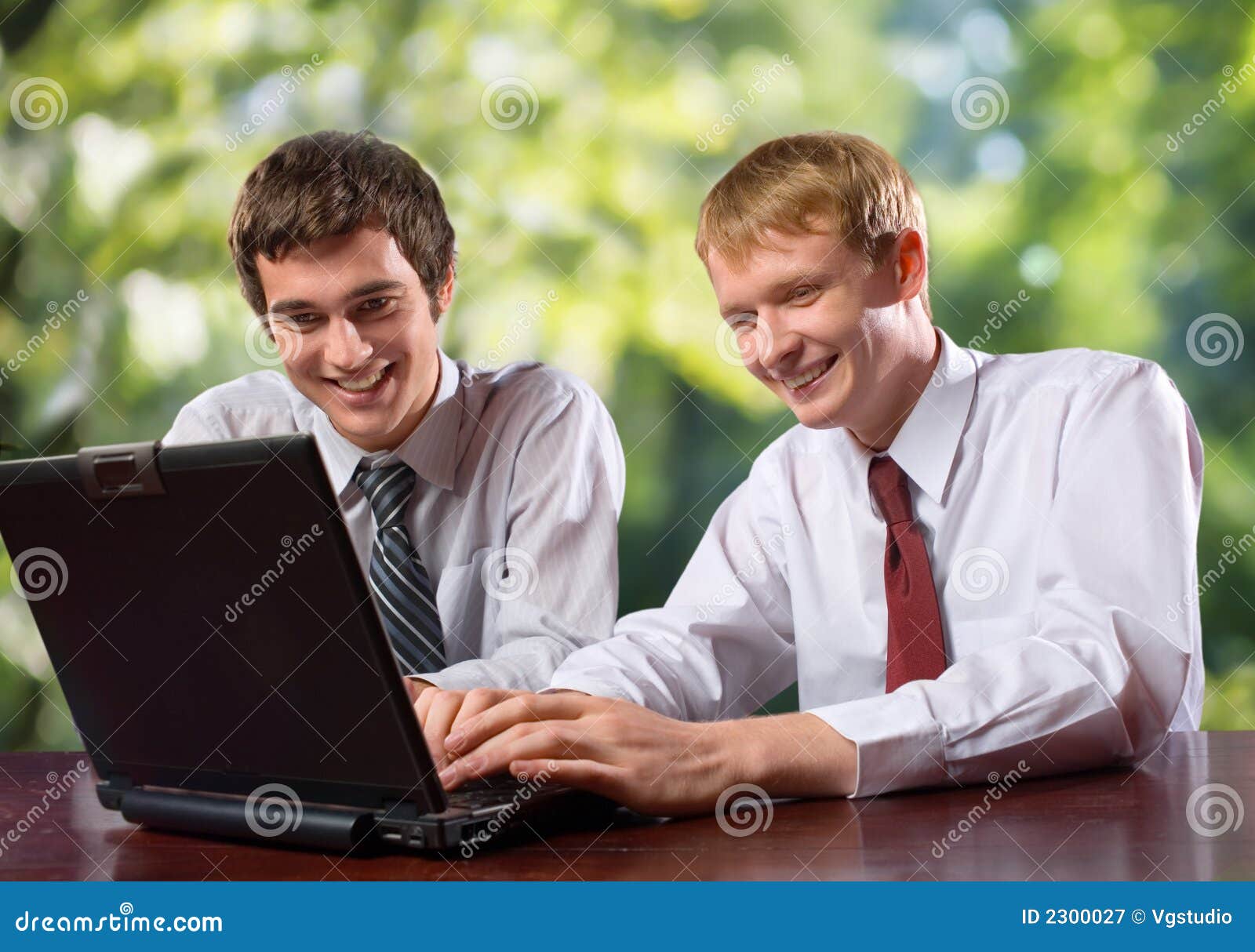 Two Business People on Laptop Stock Image - Image of caucasian, adult ...